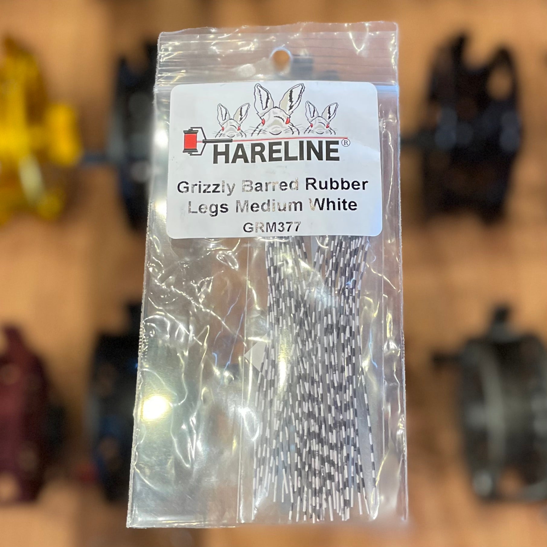 Hareline Grizzly Barred Rubber Legs - Medium – Trout Creek Outfitters
